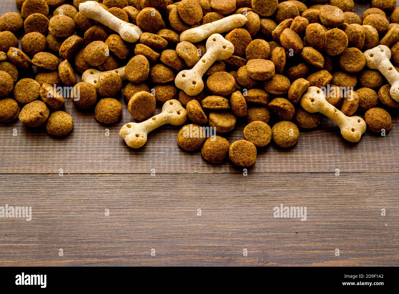 Pet food and dog bones snacks treats, overhead view Stock Photo - Alamy