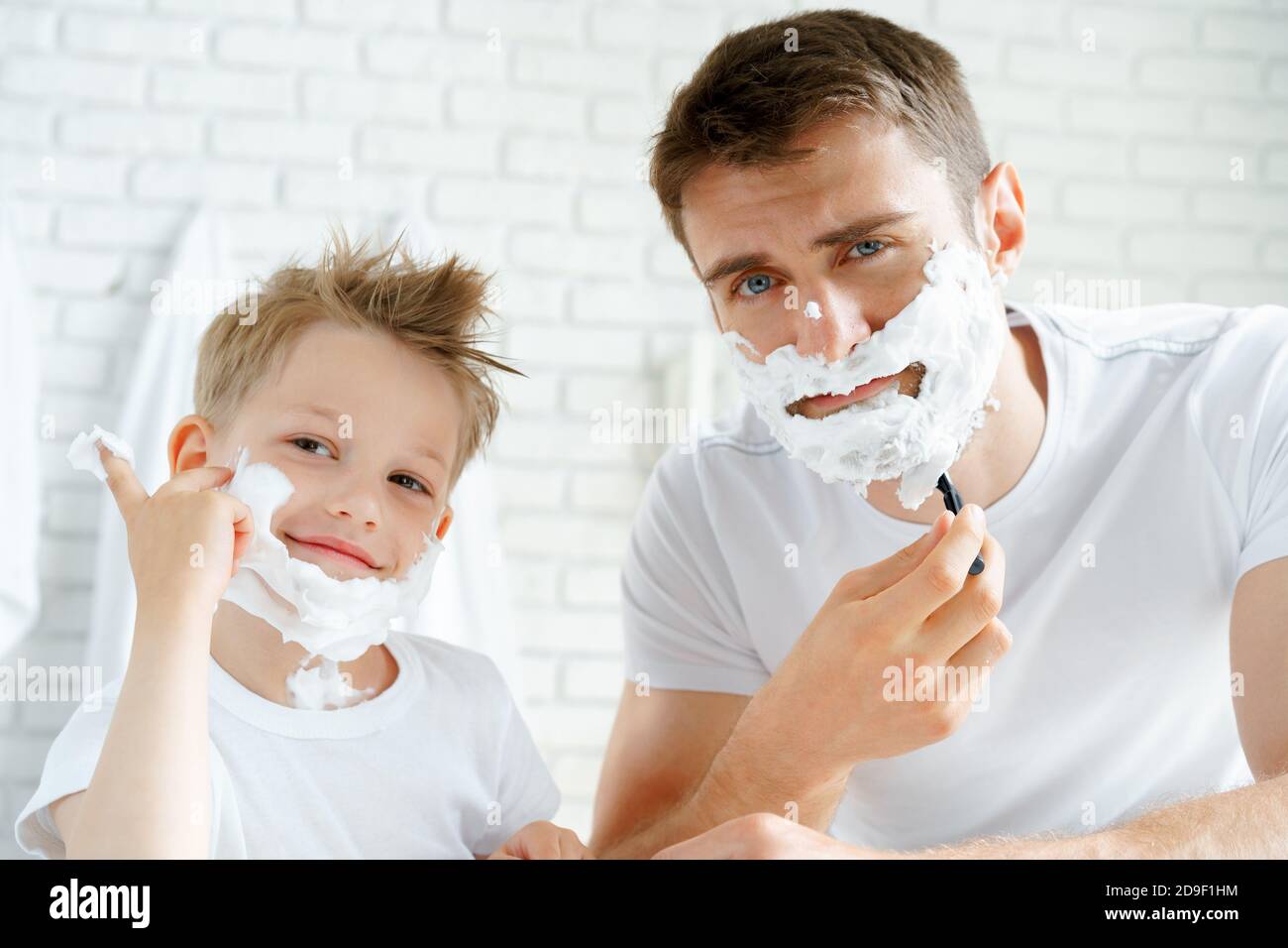Father and his little son shaving together Stock Photo - Alamy