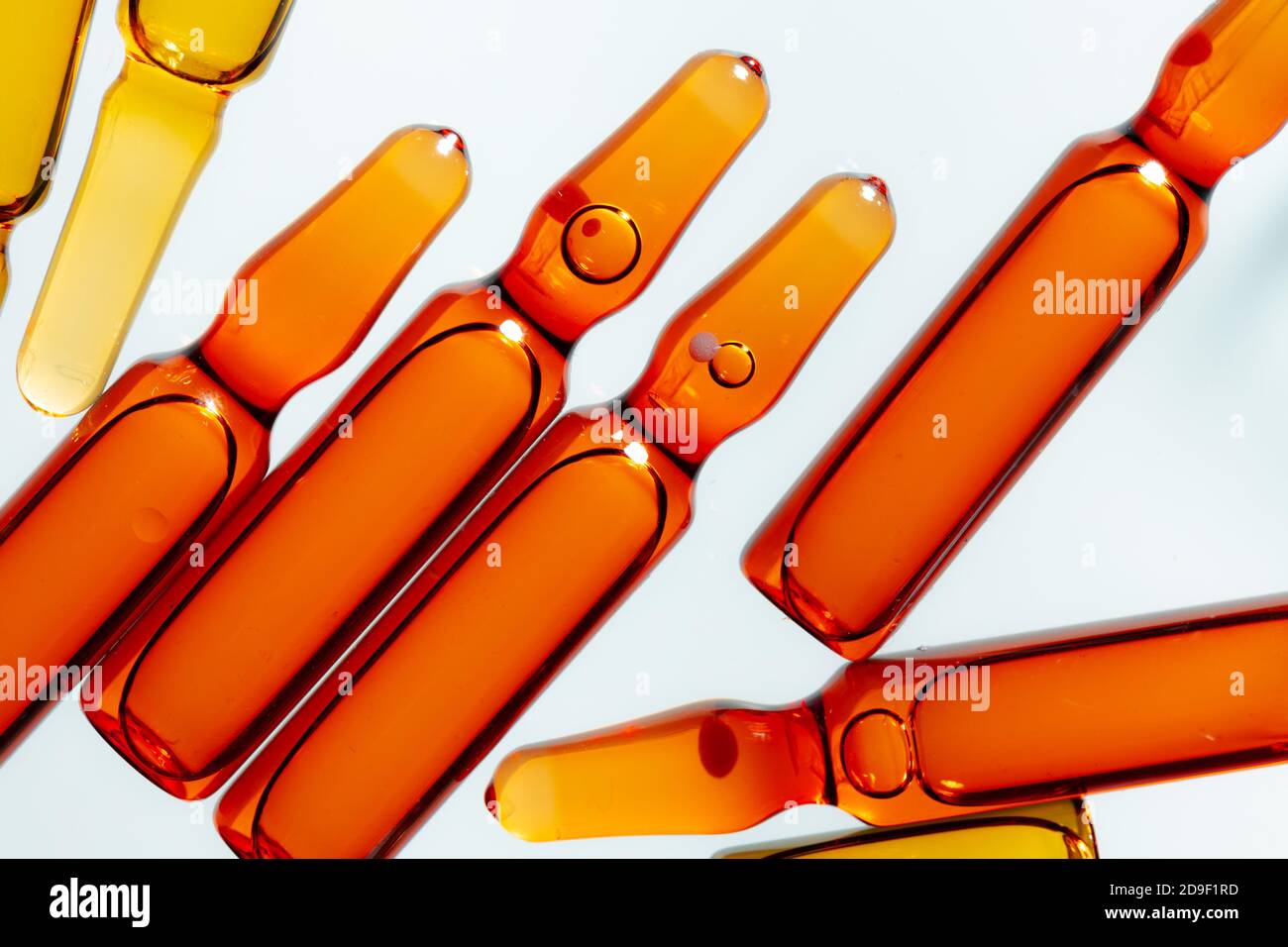 Medical background of ampule vials for injections Stock Photo - Alamy
