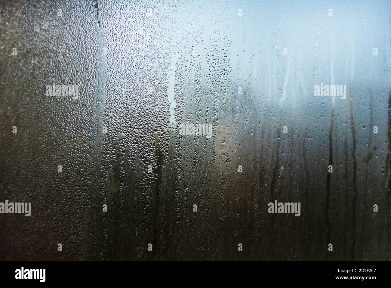 Misted window glass. Drops and trickles of water Stock Photo - Alamy