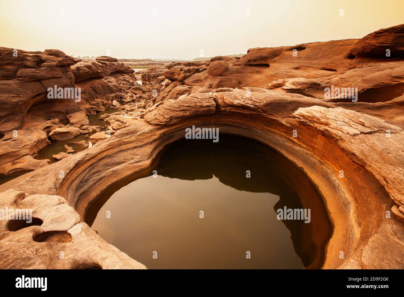 Art shape of sandstone pool in Mekong River in summer, it is eroded by ...