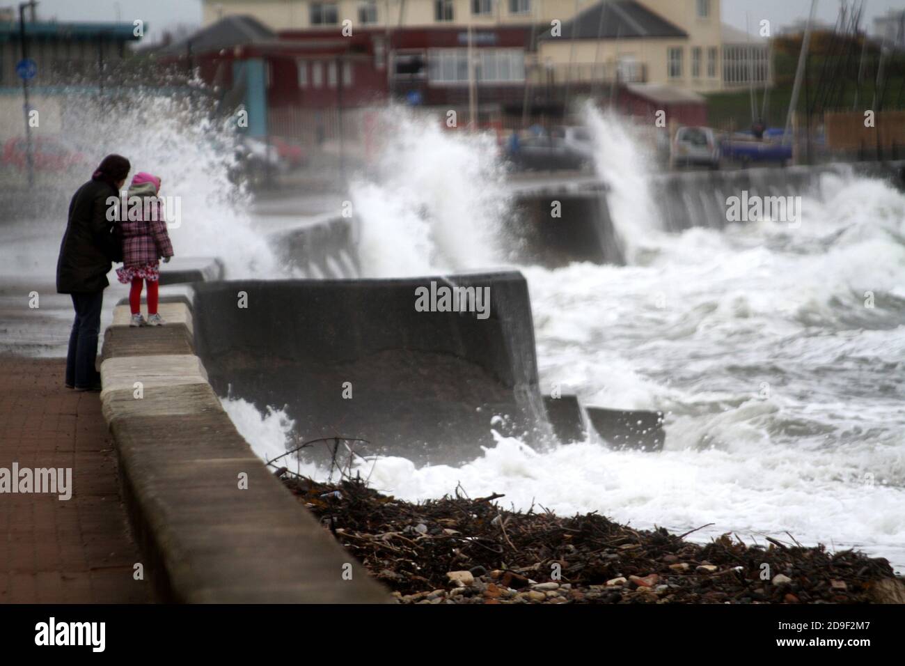 Prestwick Promenade.Ayrshire, Scotland, UK People enjoying the storm ...