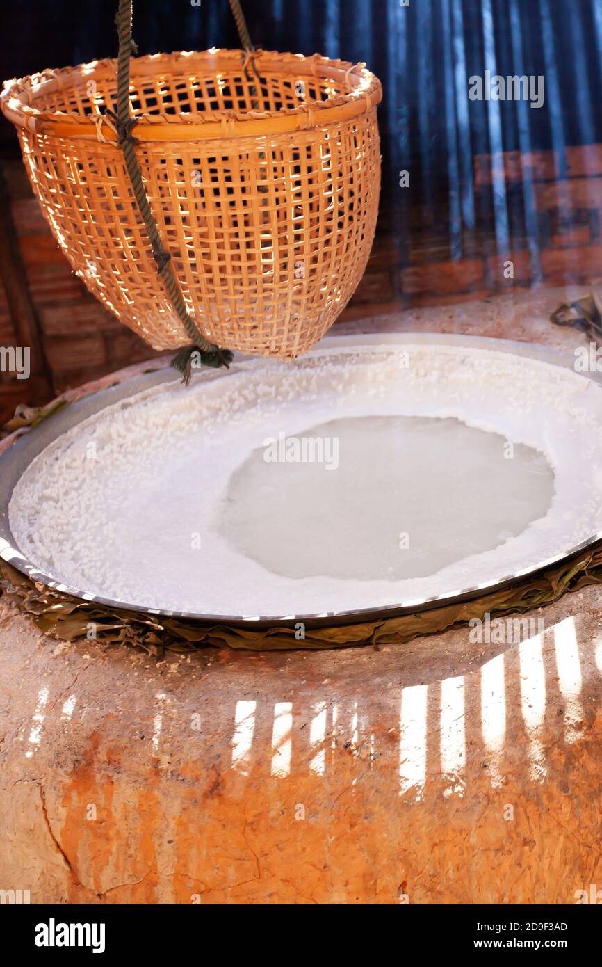 Ancient method of boiling brine into pure salt of Bo Kluea, Nan ...