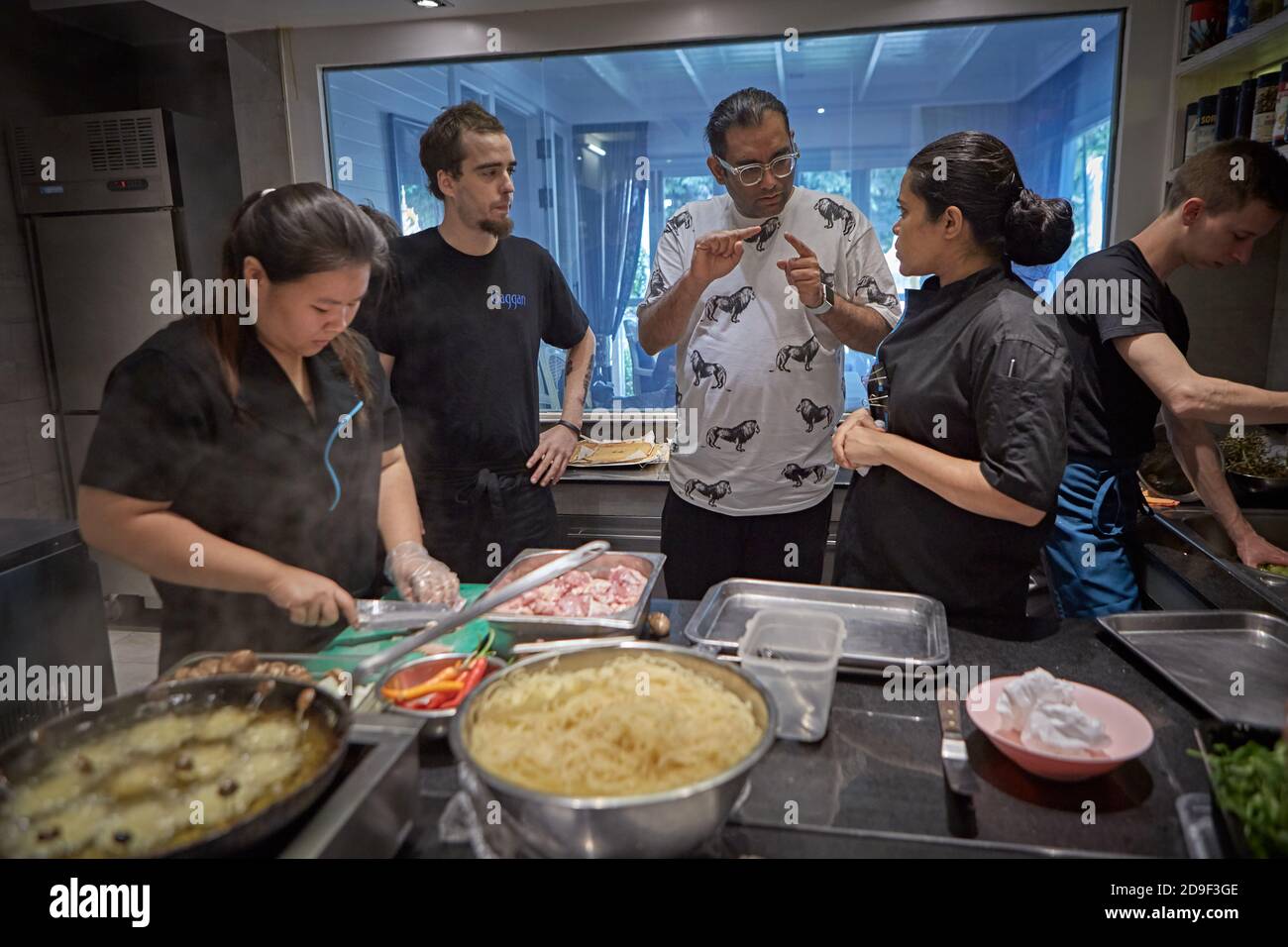 Bangkok, Thailand, March 2016. Chef Gaggan Anand working with his cooks ...