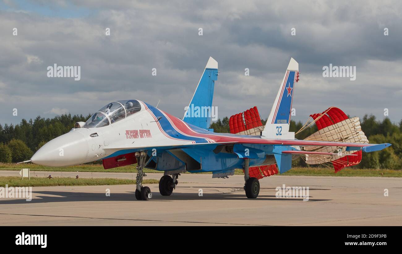 Fighter Su-35S brakes on the runway.Aviation show at the Kubinka ...