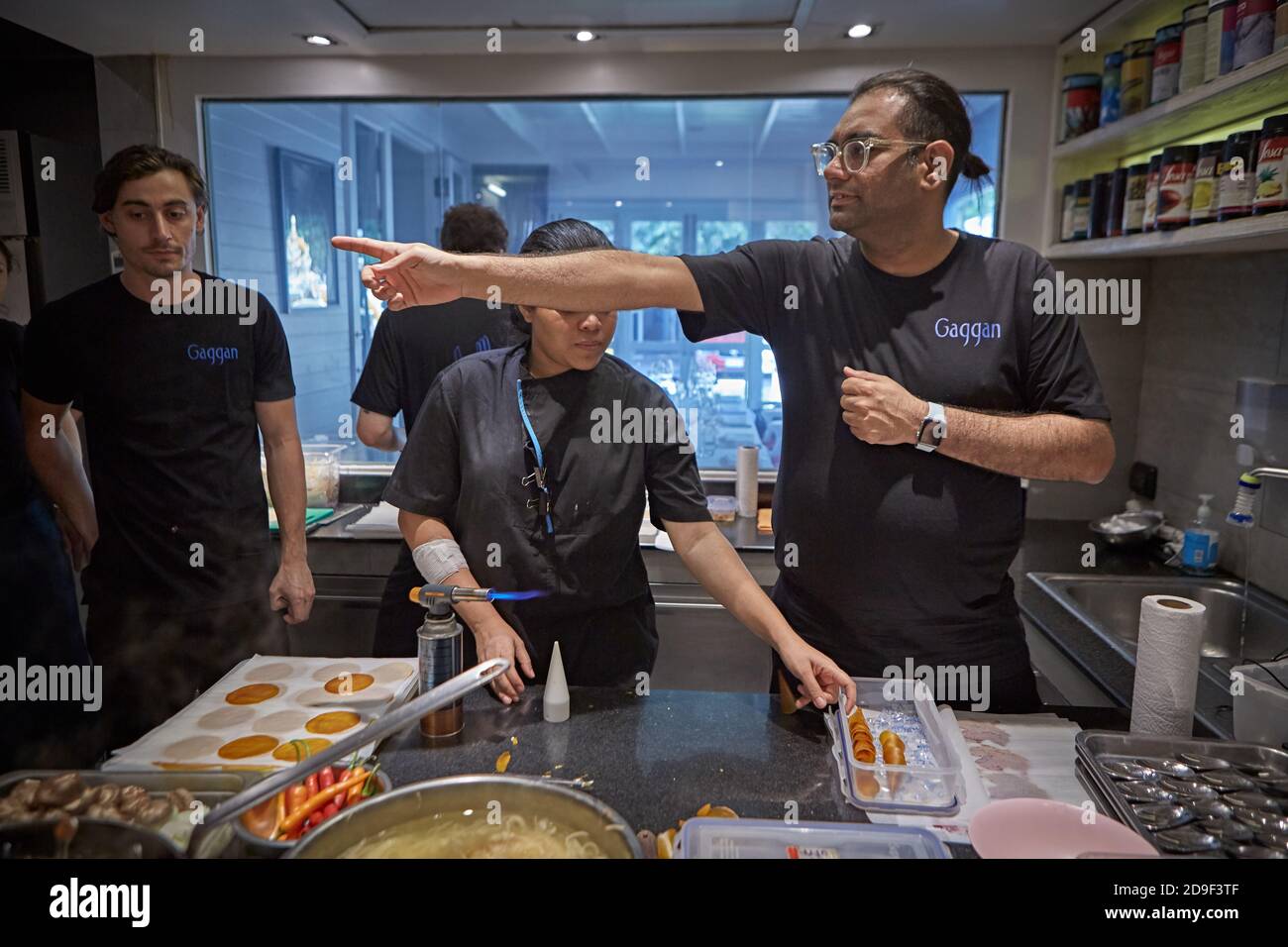 Bangkok, Thailand, March 2016. Chef Gaggan Anand working with his cooks ...