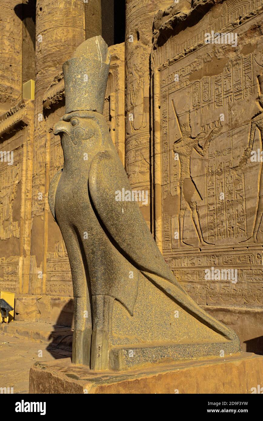 Stone sentinels of the falcon-headed god Horus watch over the Great ...