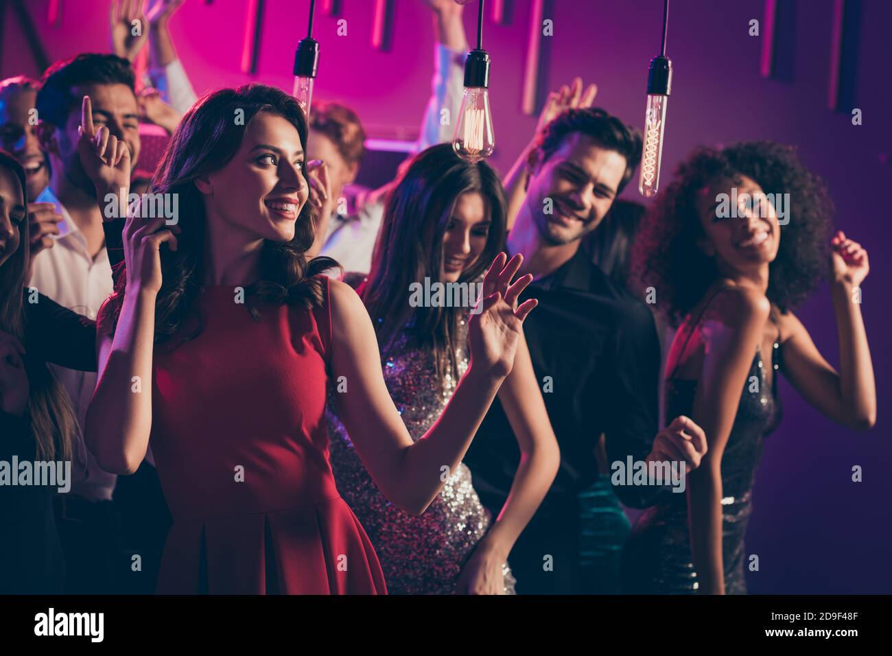 Photo portrait of dreamy girl dancing together with other people at ...
