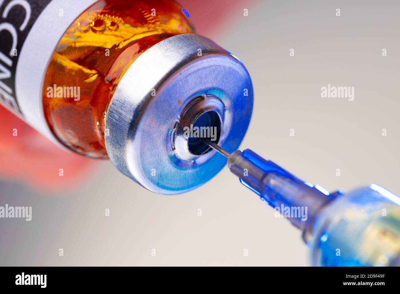 Medical vial with medication and syringe close up Stock Photo - Alamy