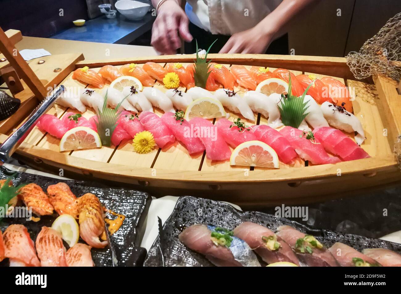 Delicious Japanese fresh sashimi sushi buffet spread at restaurant ...