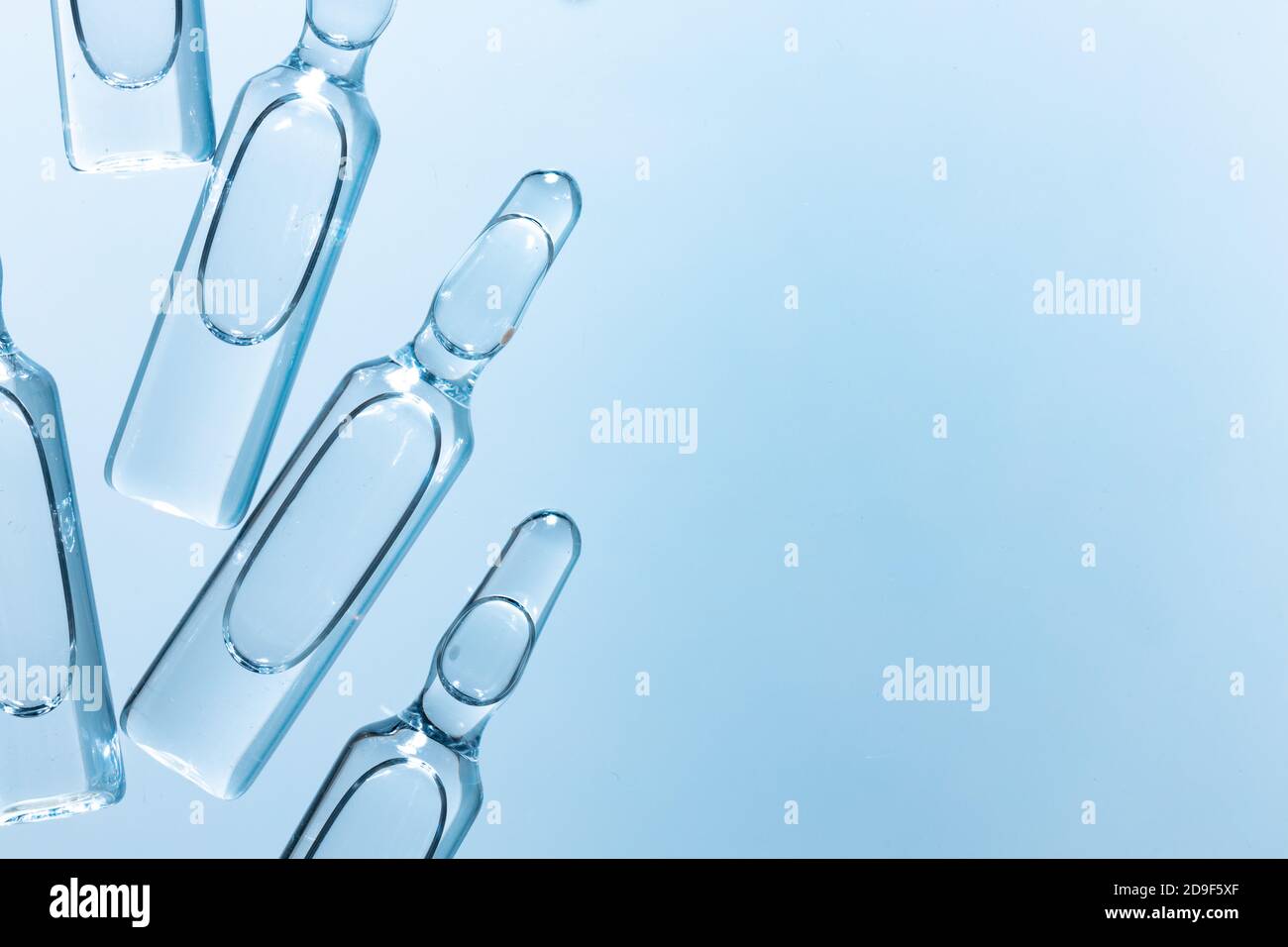 Medical background of ampule vials for injections Stock Photo - Alamy
