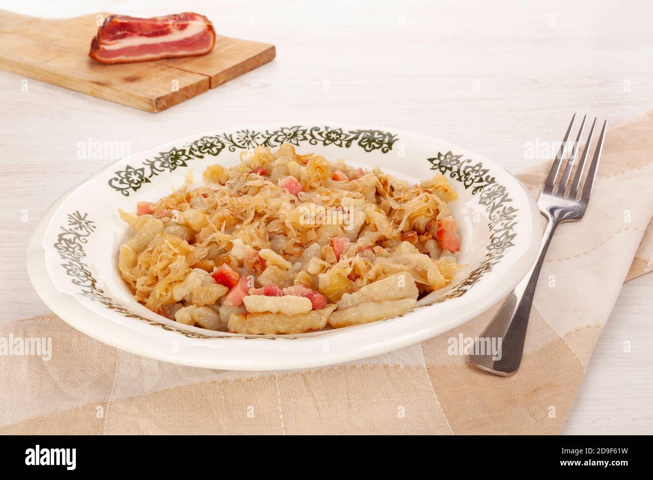 Traditional slovak food strapacky. Dumplings with bacon and sour ...