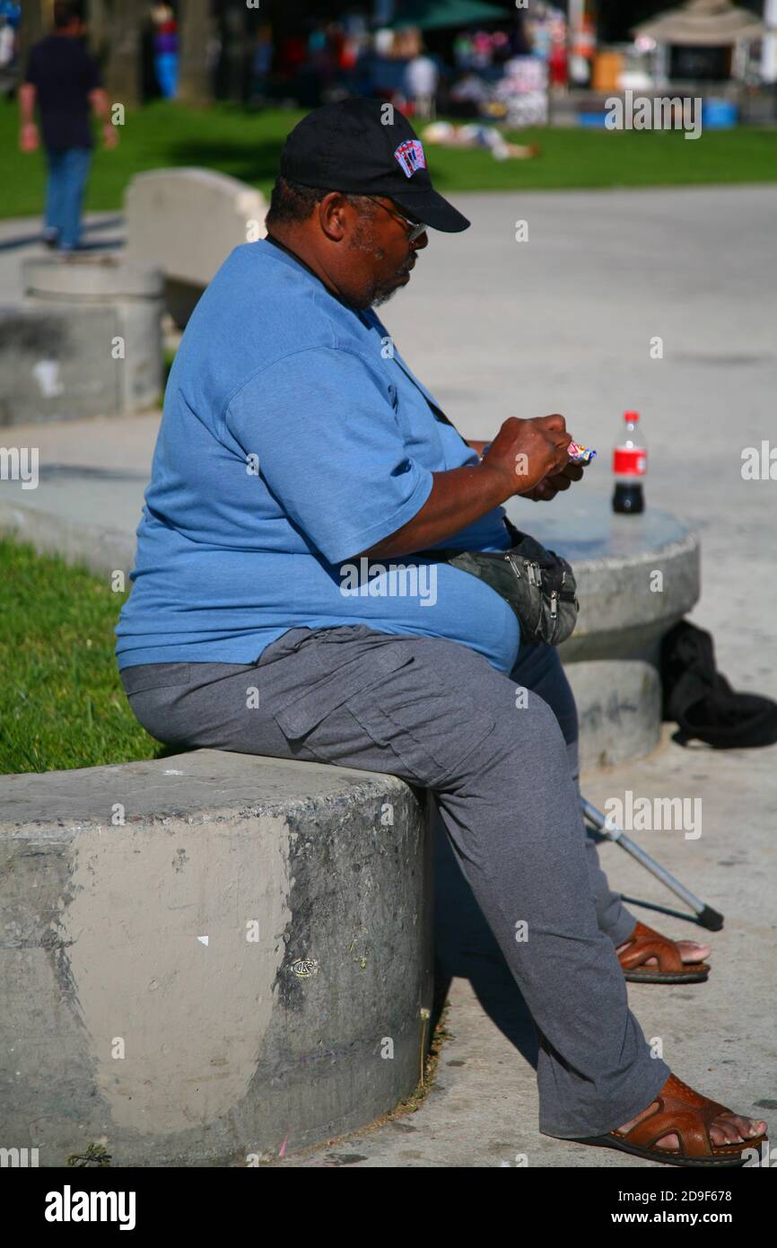 overweight man in a square Stock Photo - Alamy