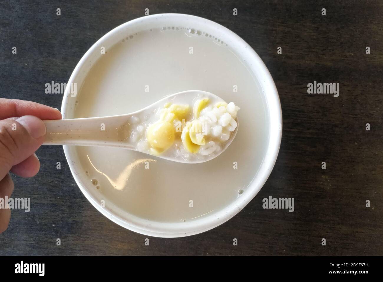 Barley drink cooked with soya and ginkgo nuts healthy preparation Stock ...
