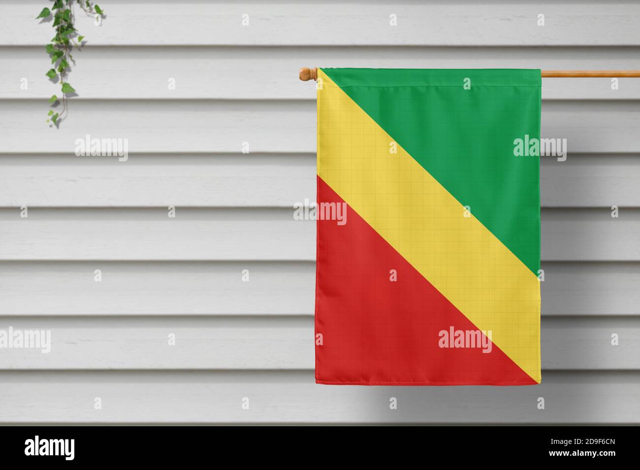 Republic Of The Congo national small flag hangs from a picket fence ...