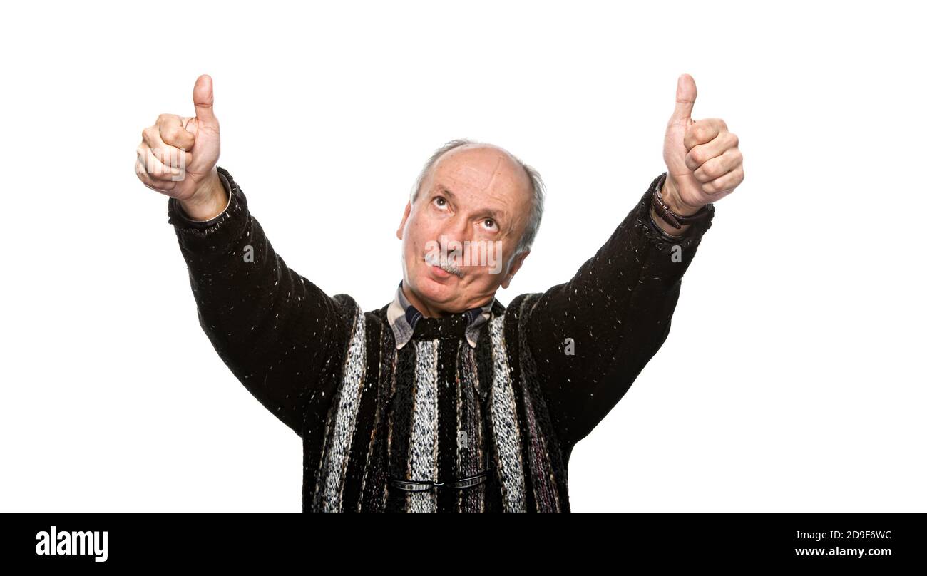 Successful man shows ok sigh isolated on white background. Focus on ...