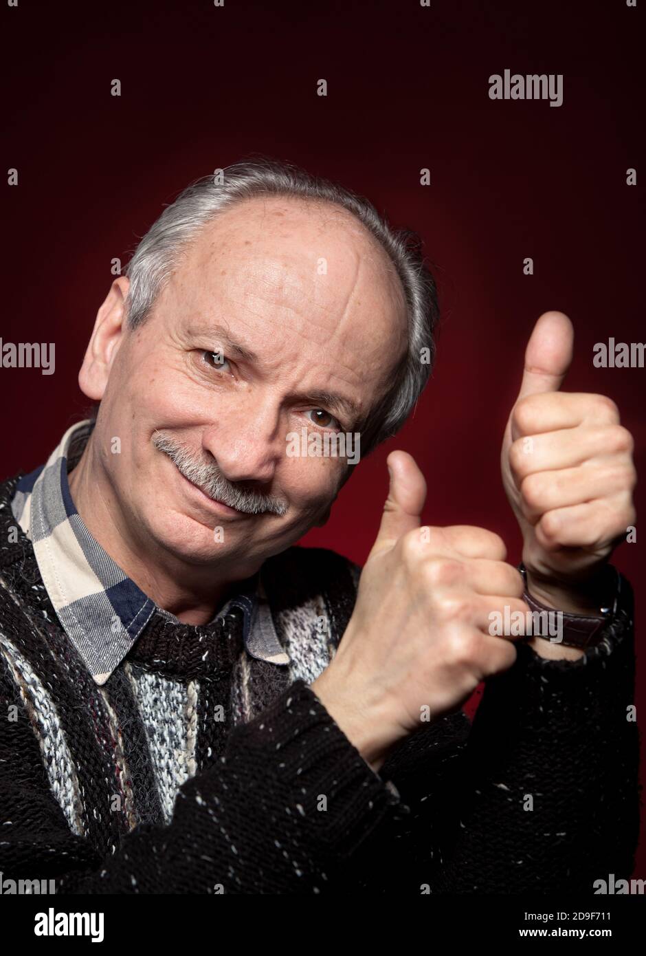 Successful man shows ok sigh Stock Photo - Alamy