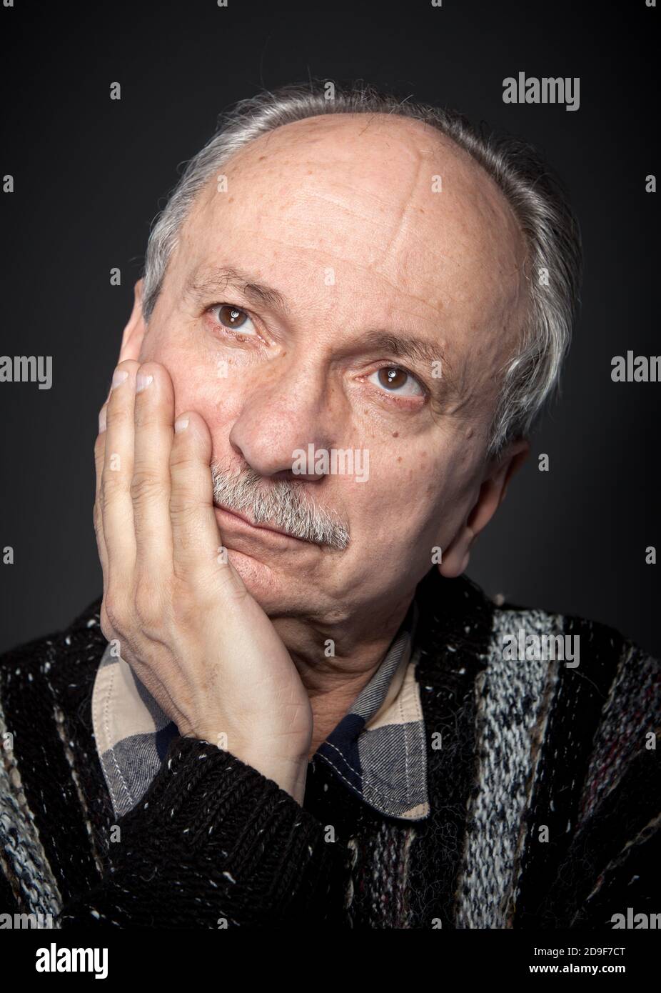 Portrait of handsome senior man with a tired expression Stock Photo - Alamy