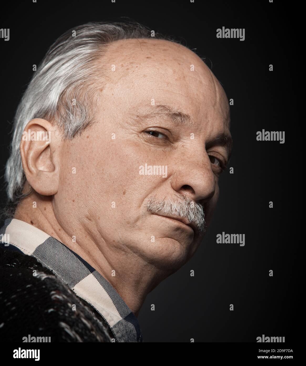 Old senior man closeup serious expression portrait Stock Photo - Alamy