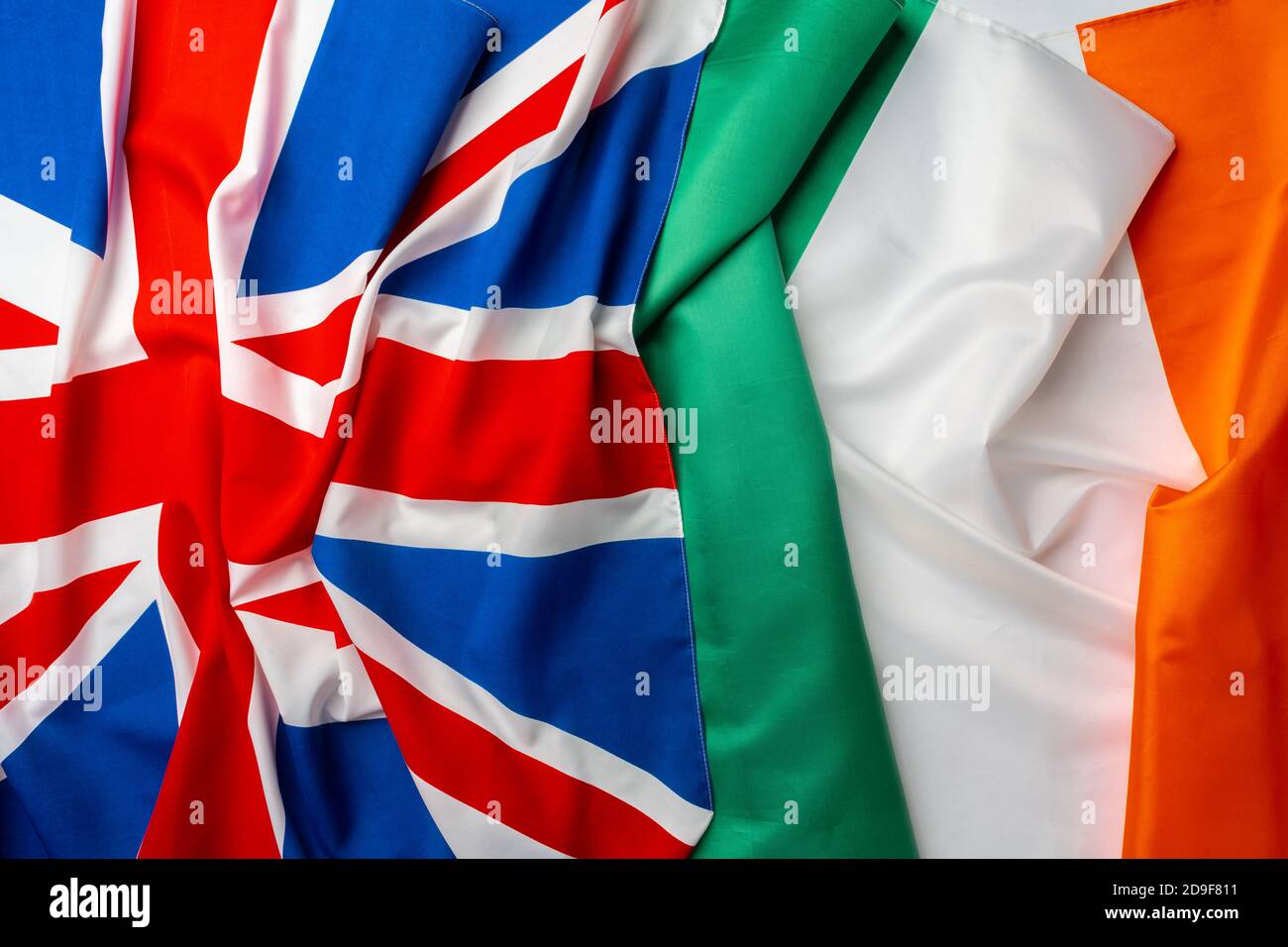 Flags of UK and Ireland folded together Stock Photo - Alamy