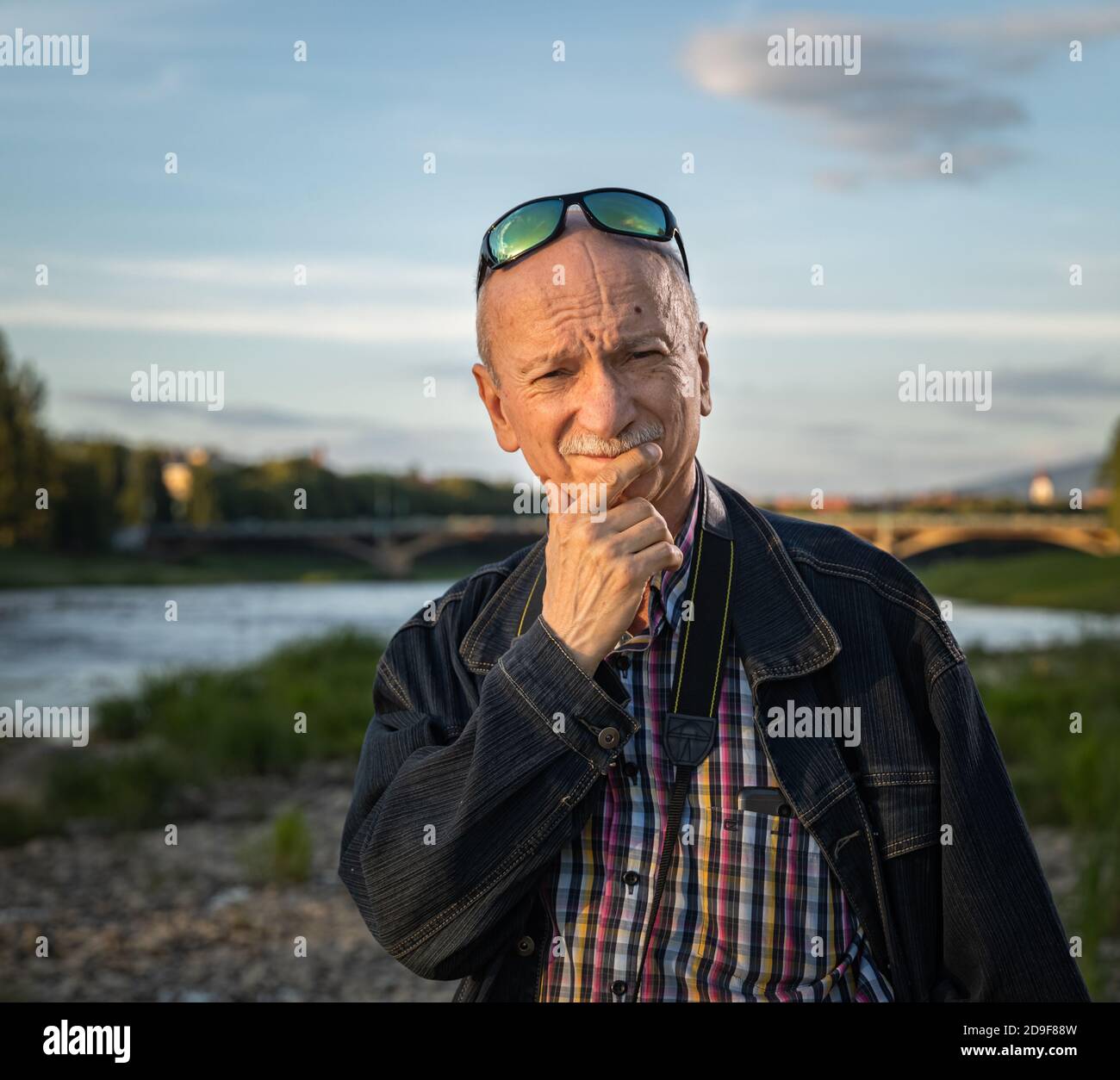 Life style concept. Old man. Portrait of a wise, skeptical and tired of ...