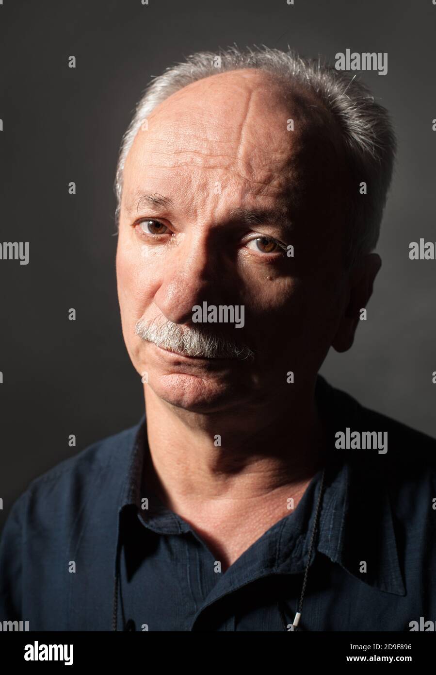 Portrait of handsome senior man Stock Photo - Alamy
