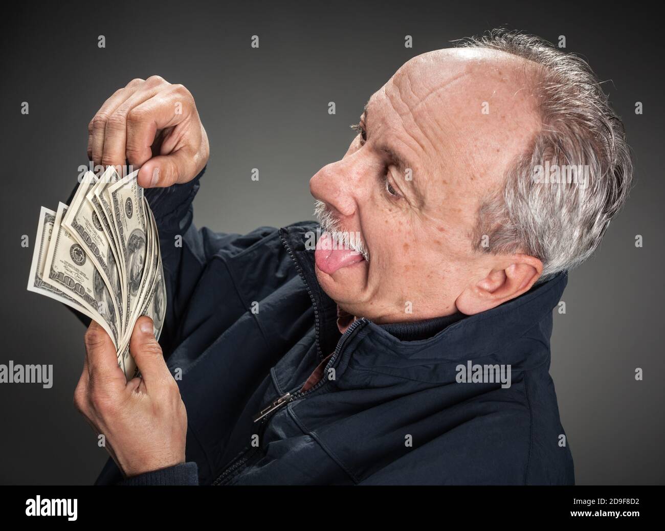 Face of avarice hi-res stock photography and images - Alamy