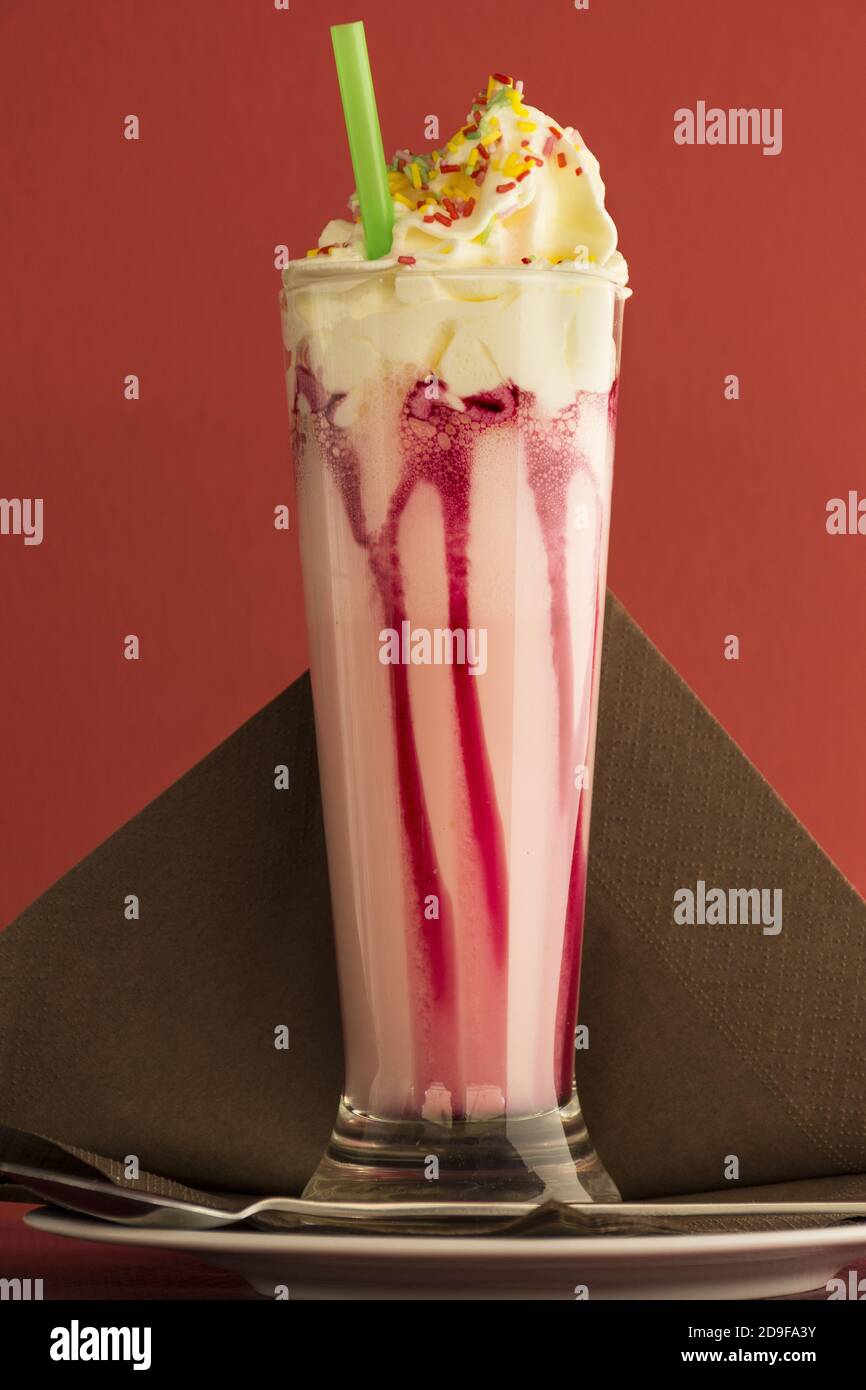 Vertical closeup shot of a delicious-looking milkshake Stock Photo - Alamy