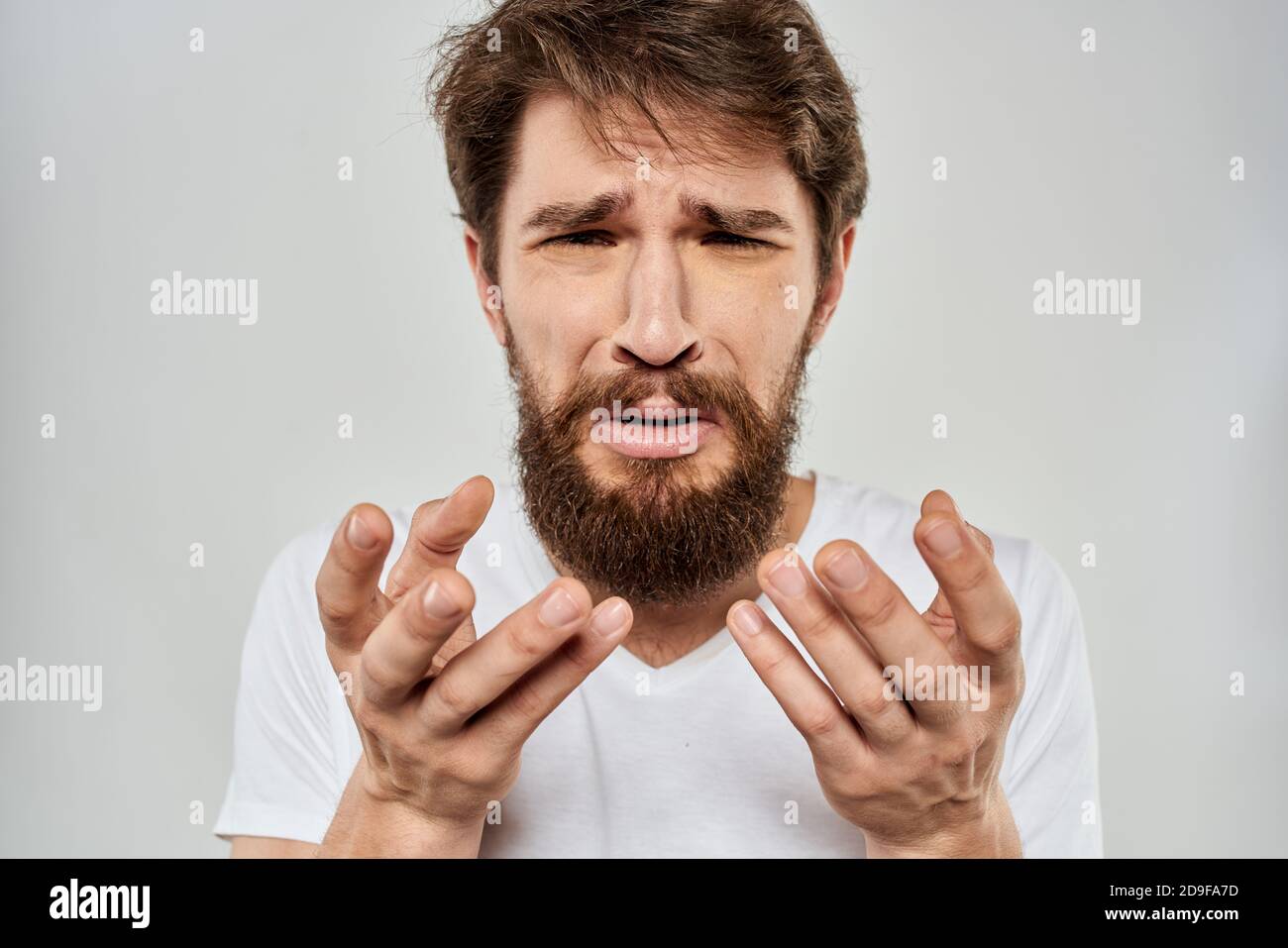 emotional bearded man close-up facial expression studio lifestyle Stock ...