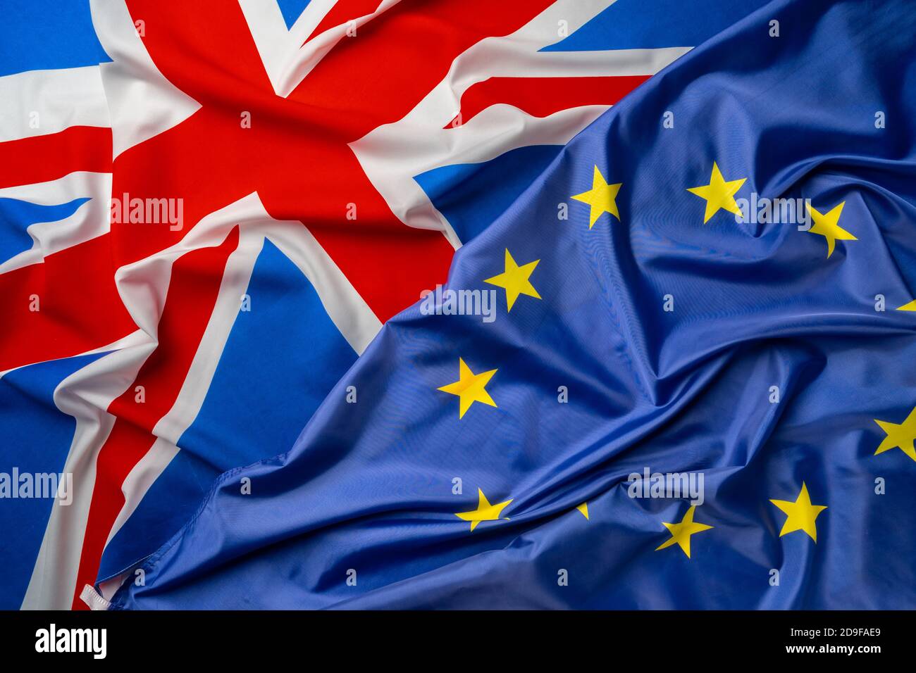 Flags of United Kingdom and European Union folded together Stock Photo ...