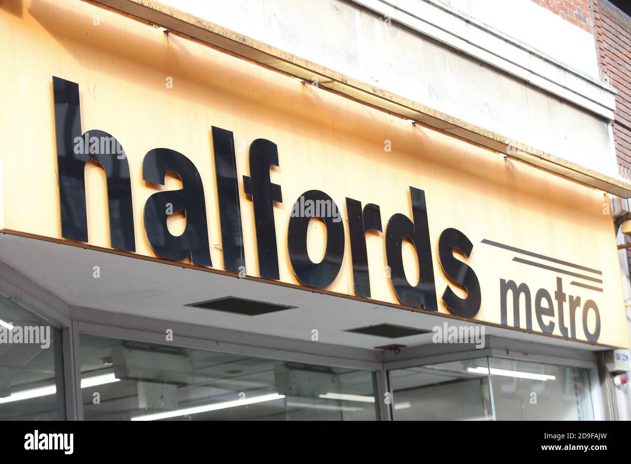 Halfords Metro sign, Kingston Upon Thames, Surrey Stock Photo - Alamy