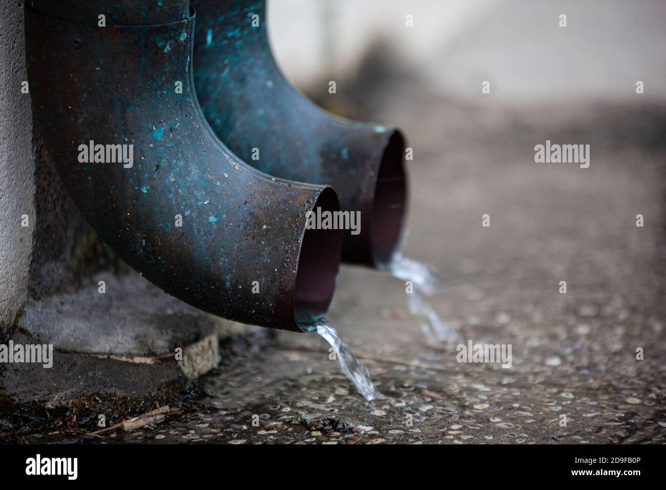 Rain falling from gutter hi-res stock photography and images - Alamy