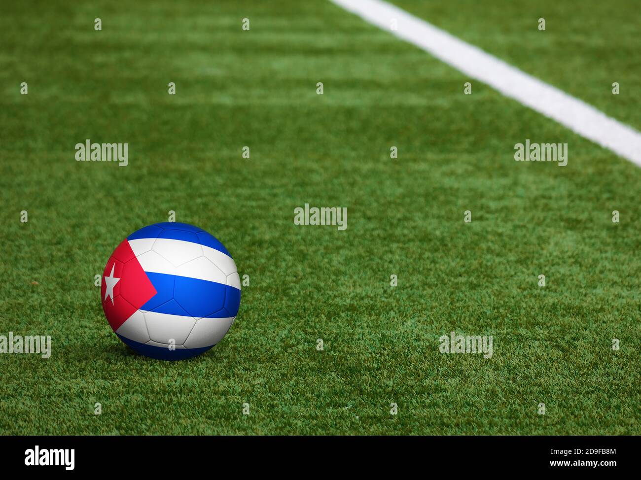 Cuba flag on ball at soccer field background. National football theme ...