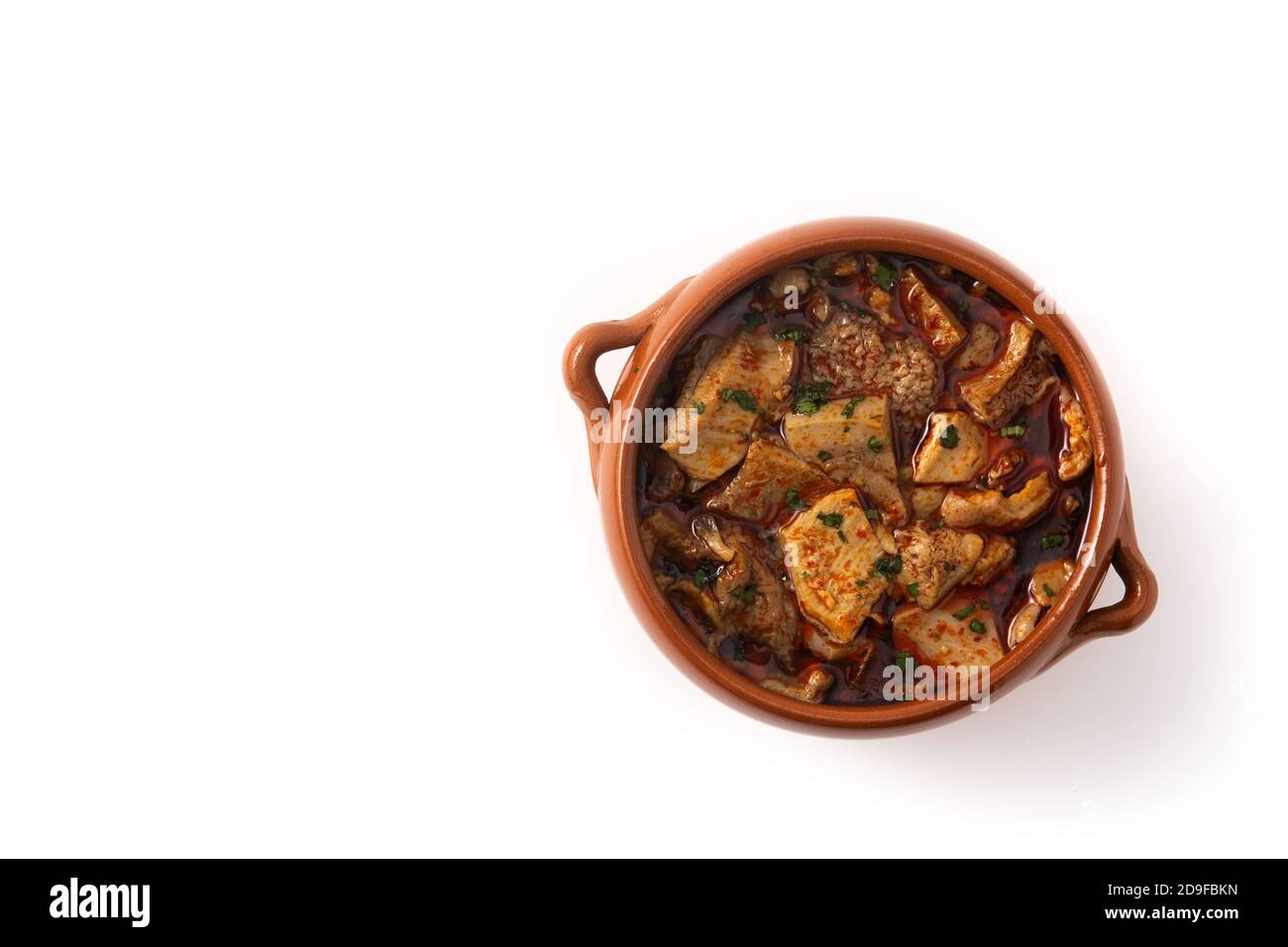 Traditional mondongo or el menudo soup isolated on white background ...