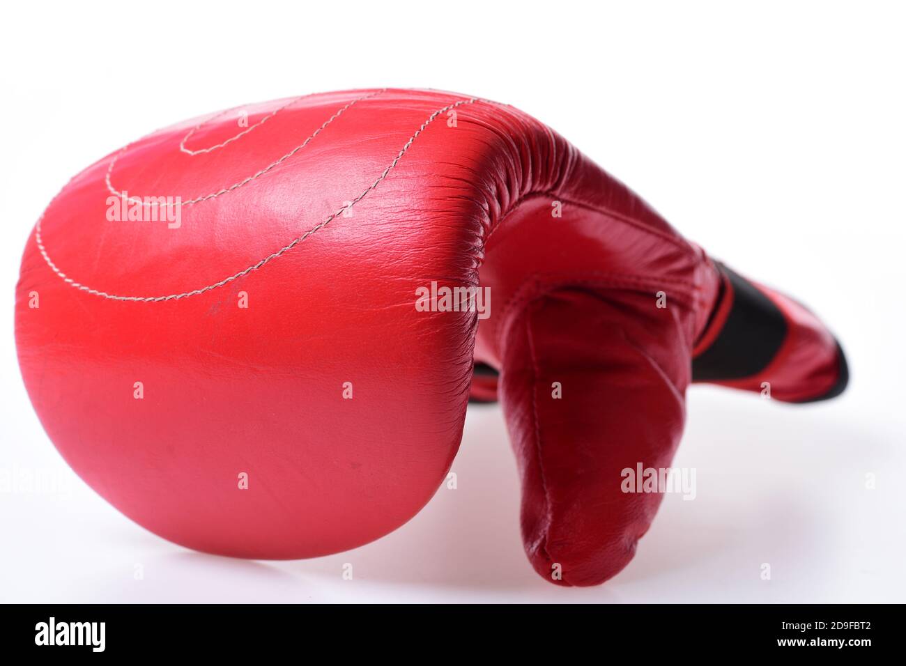 Protection and strength concept. Boxing glove in red color isolated on ...