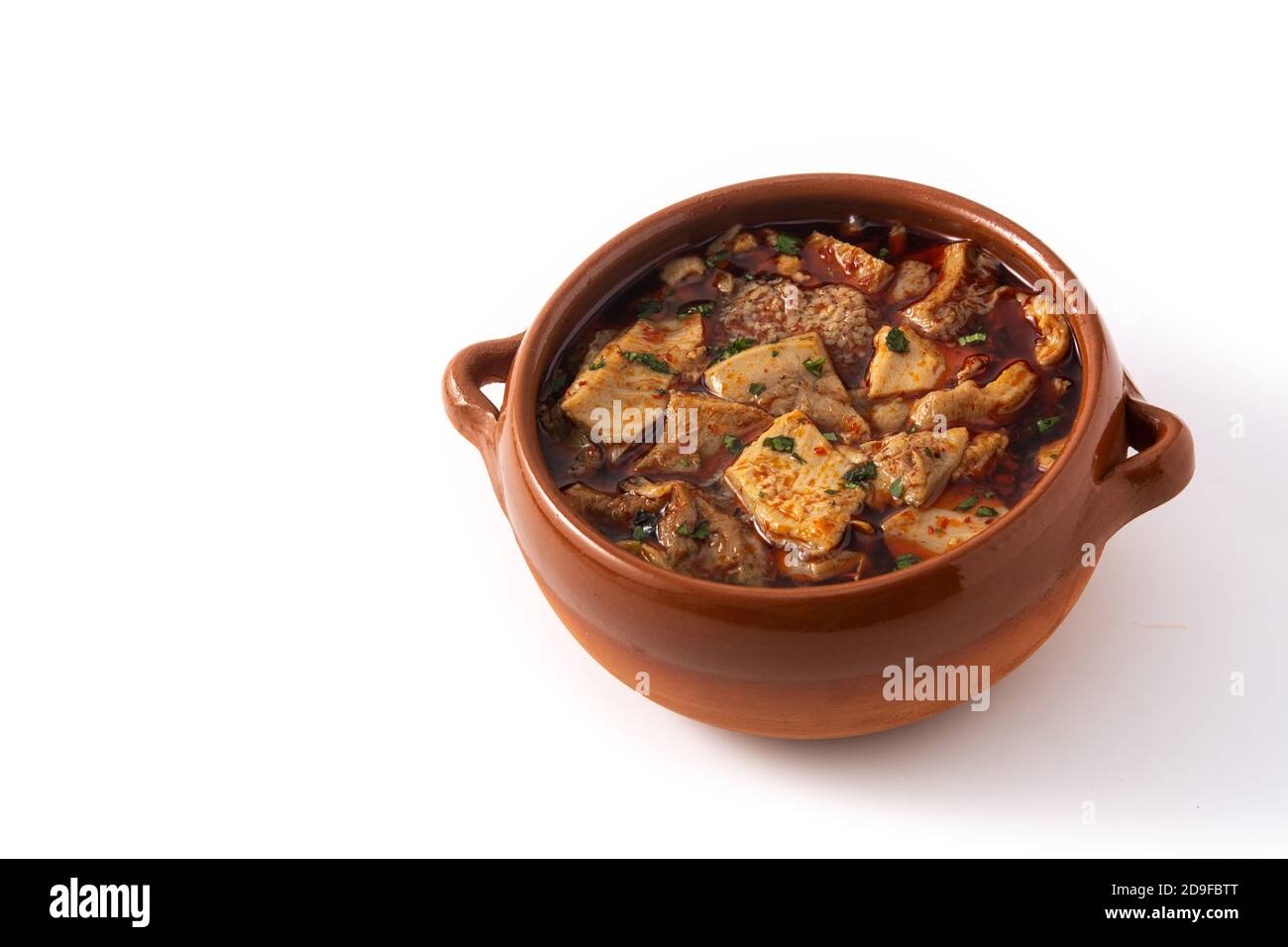 Traditional mondongo or el menudo soup isolated on white background ...