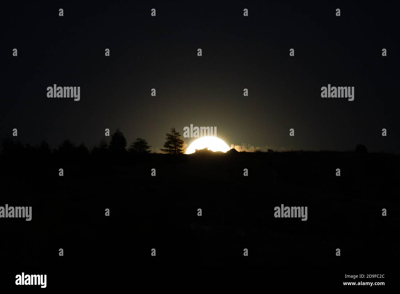 Moonrise over hills hi-res stock photography and images - Alamy