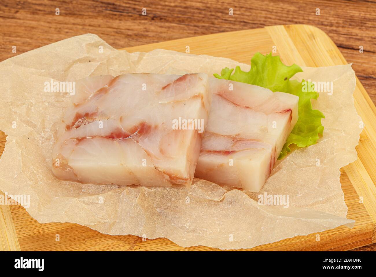Raw dietary pollock fish fillet for cooking Stock Photo - Alamy