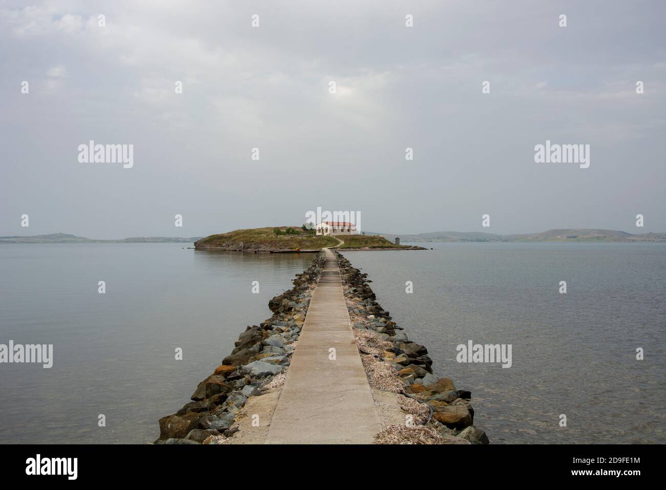 Stone pier leading to a house on the secluded islet Stock Photo - Alamy