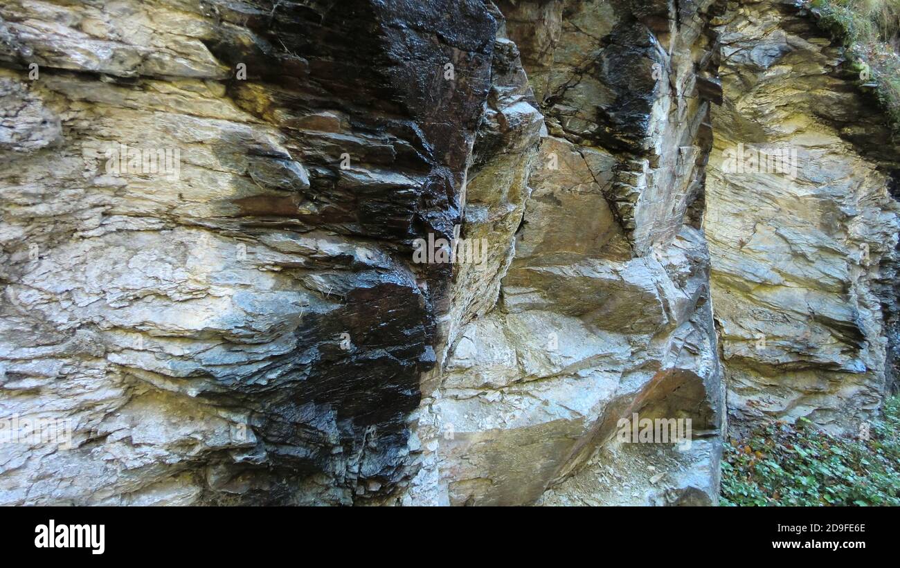 Rocky wall in dolomites with clearly visible details of the ripples ...