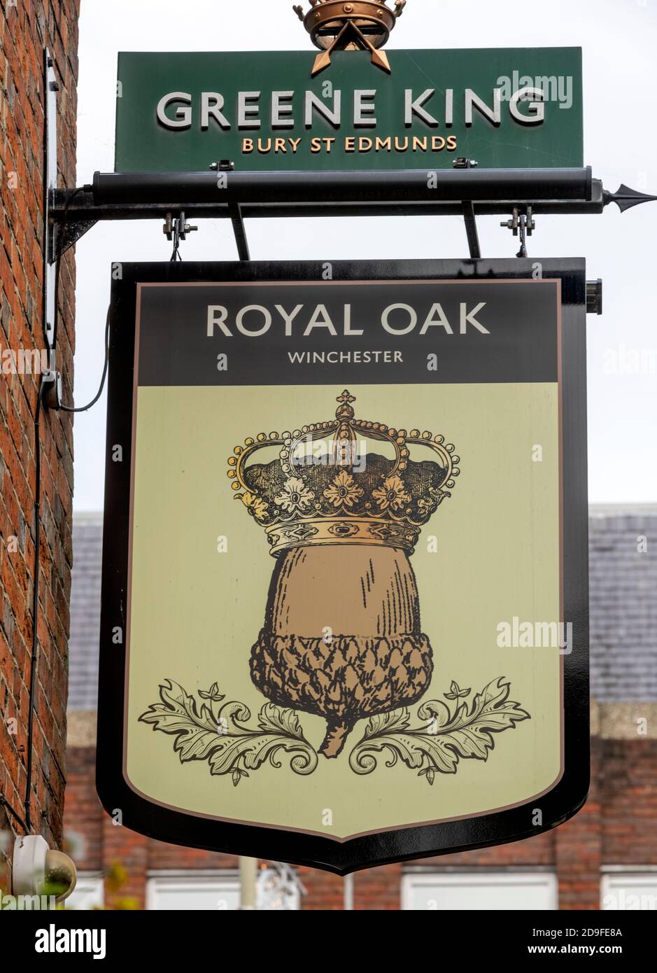 Traditional hanging pub sign at The Royal Oak public house a Greene ...