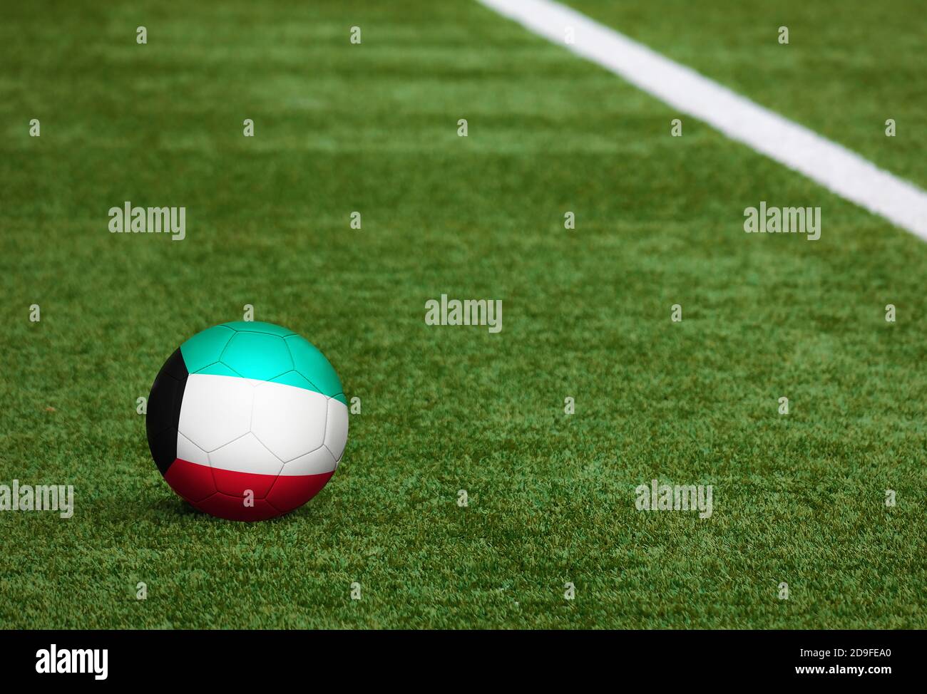 Kuwait flag on ball at soccer field background. National football theme ...