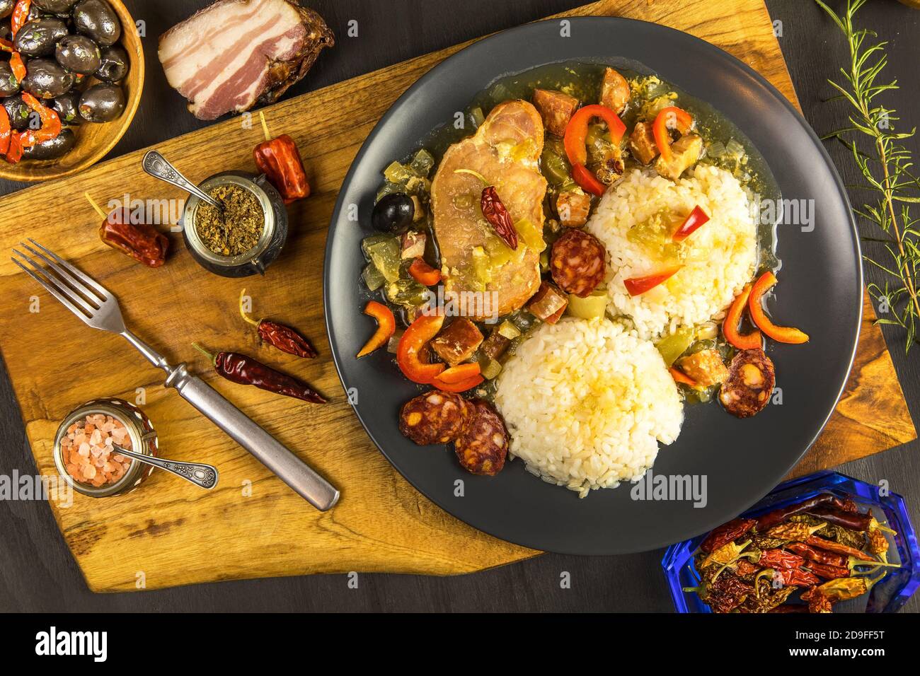 Food and drink concept. Roasted pork chop and rice as main course. Pork ...