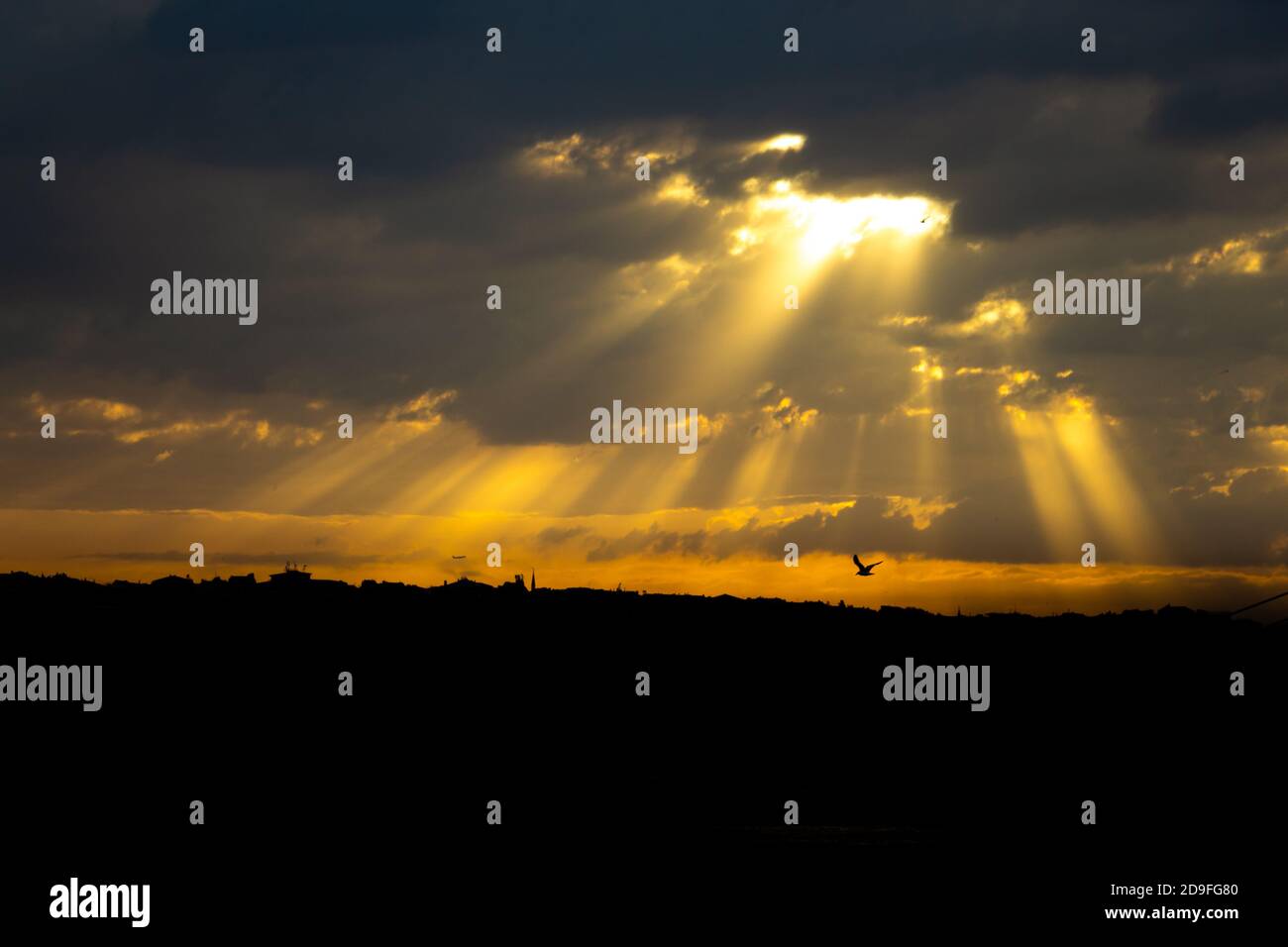 Sunlight beams in the clouds Stock Photo - Alamy