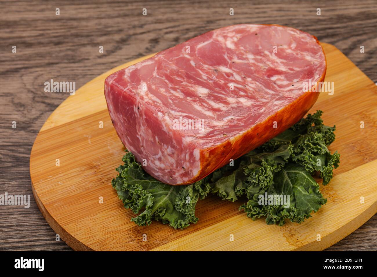 Tasty Beef ham piece over board Stock Photo - Alamy