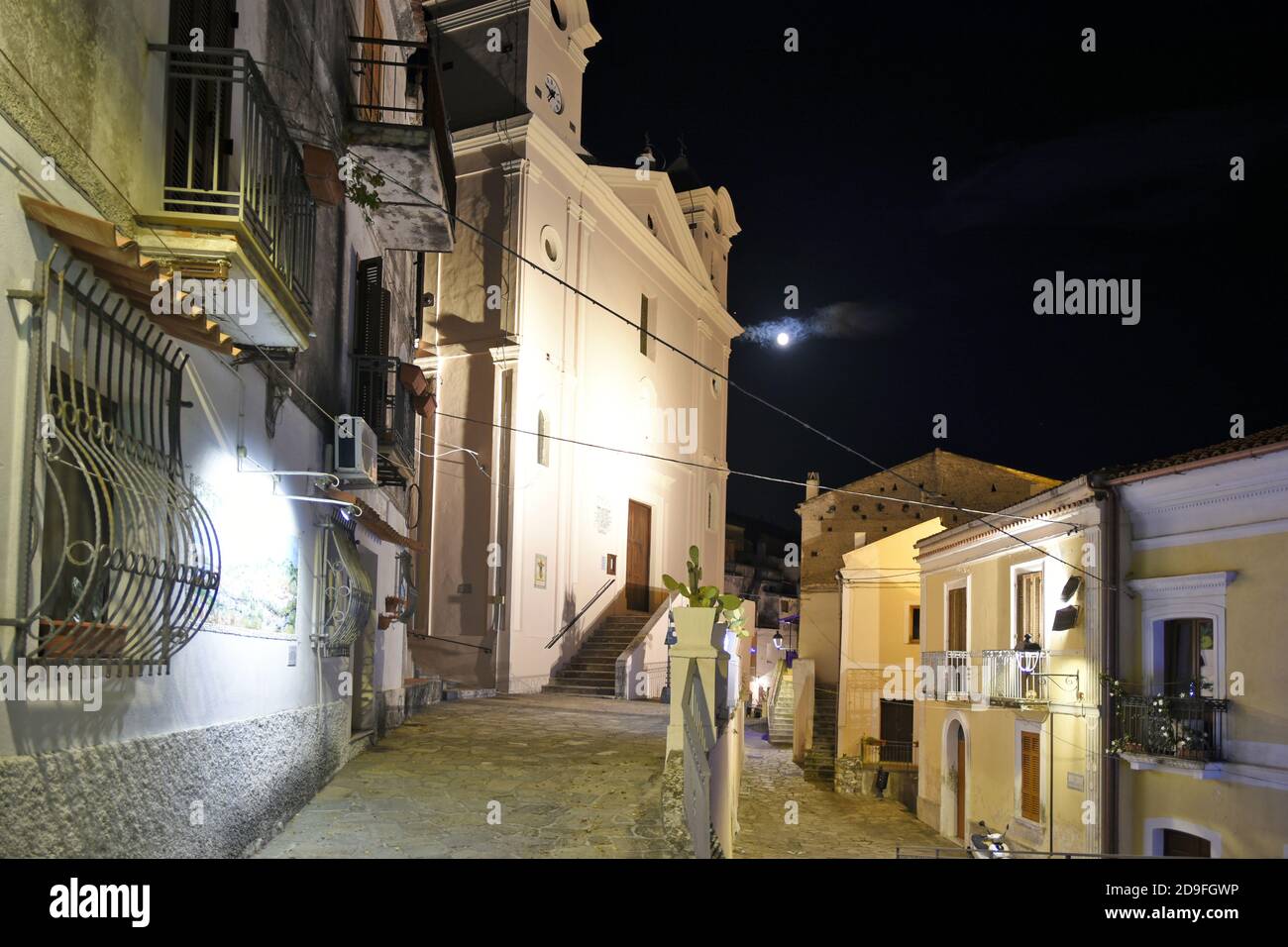 A narrow street among the old houses of San Nicola Arcella, a rural ...