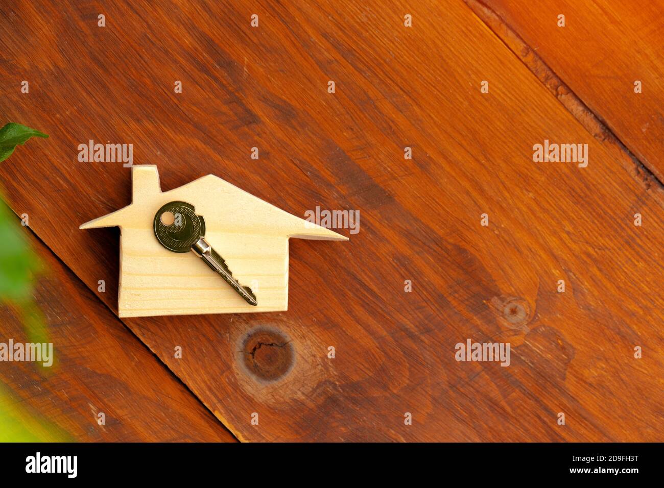 Wooden house model miniature and house keys Stock Photo - Alamy