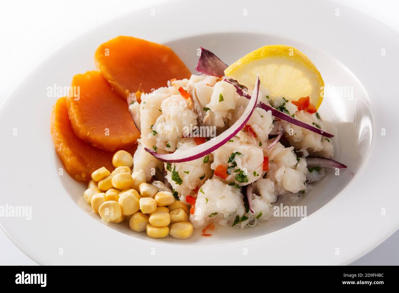 Traditional peruvian ceviche with fish, sweet potato, corn and ...