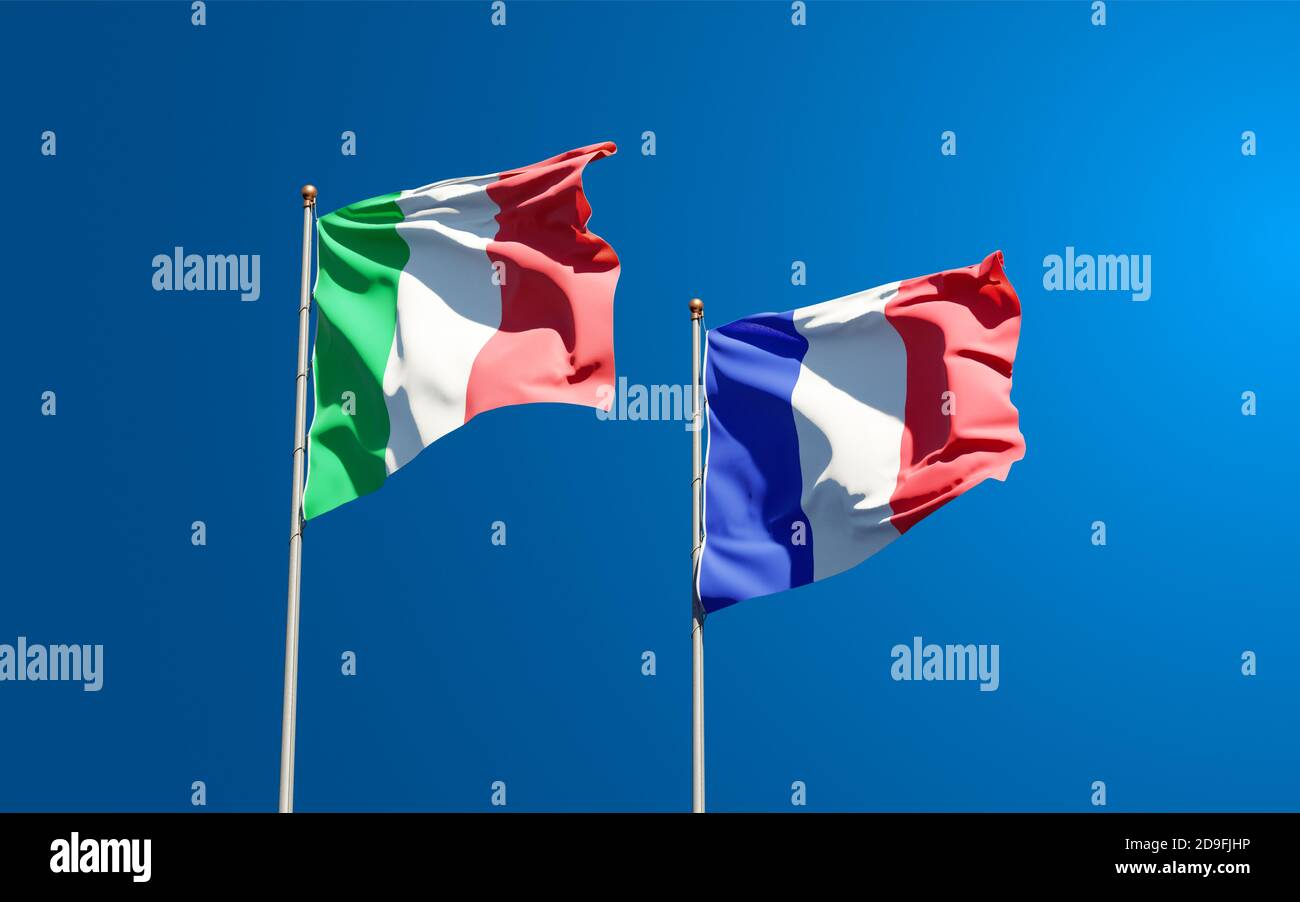 Beautiful national state flags of Italy and France together at the sky ...