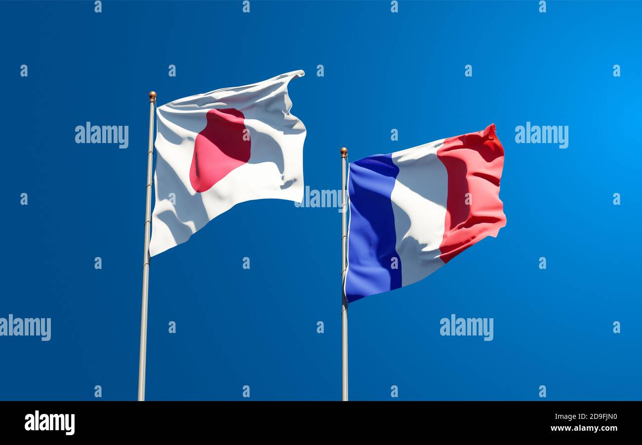 Beautiful national state flags of Japan and France together at the sky ...